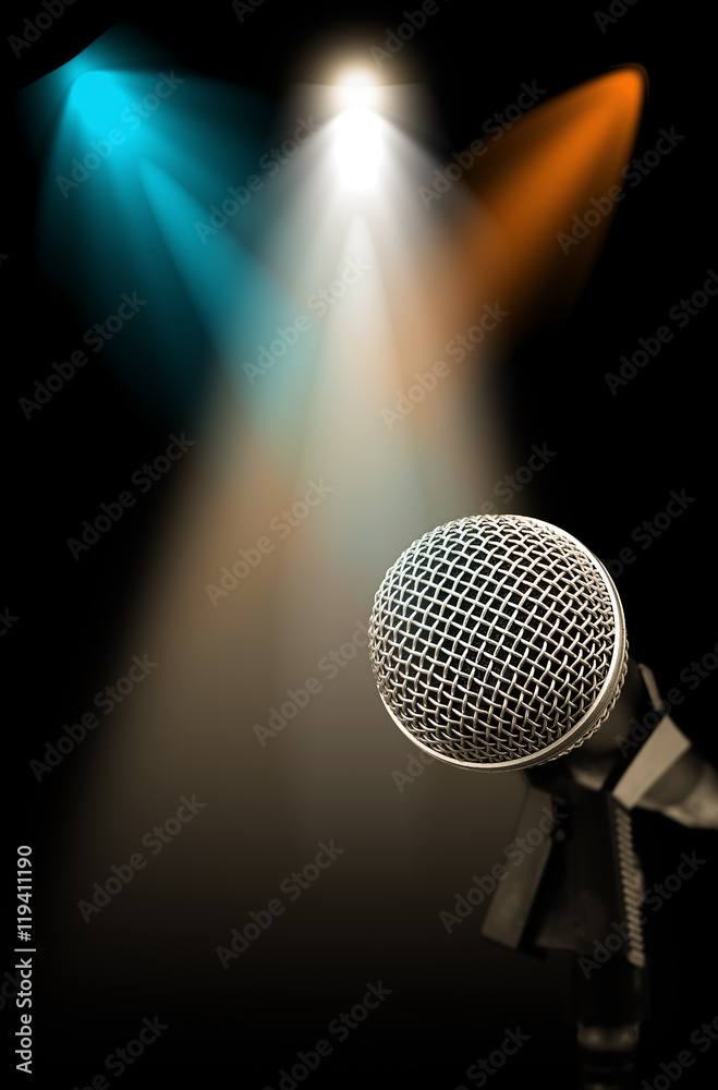 microphone on stage with colorful spotlight background Stock Photo ...