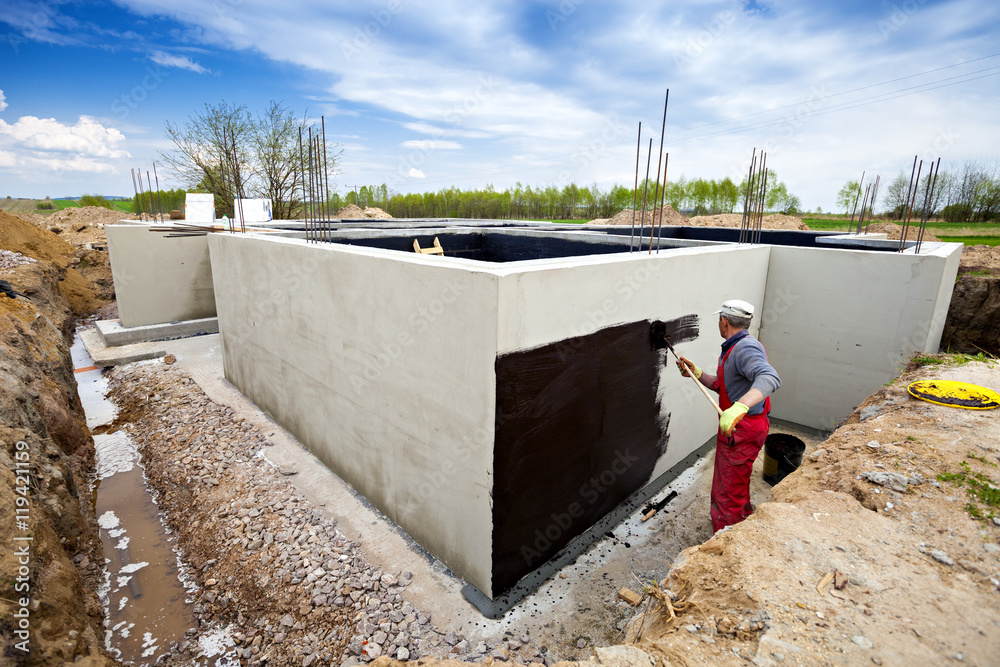 Waterproofing foundation building Stock Photo | Adobe Stock