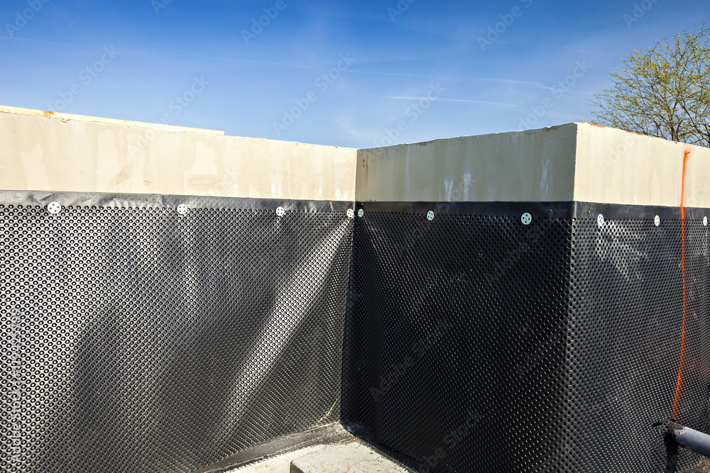 Waterproofing foundation building Stock Photo | Adobe Stock