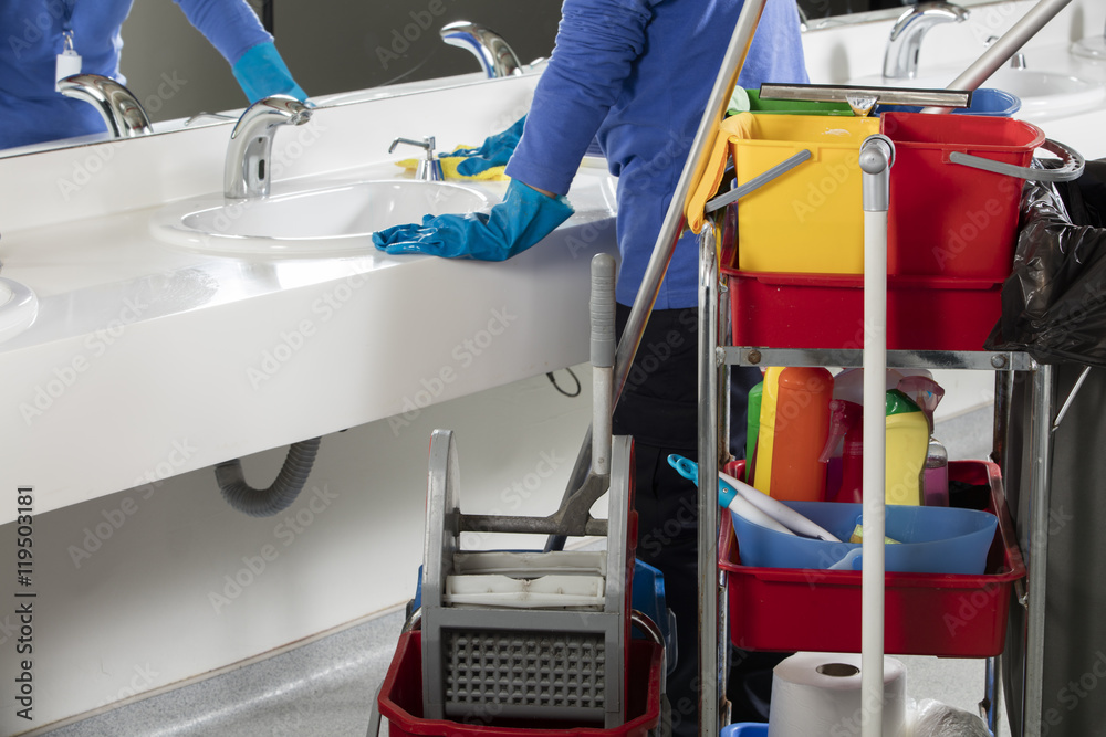 rubber gloved hand cleaning sink with duster Stock Photo | Adobe Stock