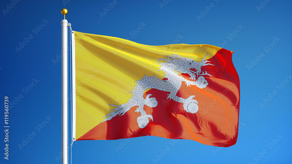 Bhutan flag waving against clean blue sky, close up, isolated with ...
