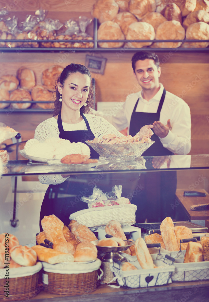 Portrait of couple at bakery display with pastry Stock Photo | Adobe Stock