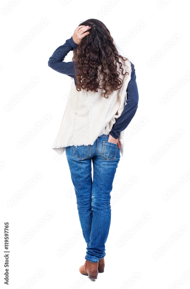 back view of standing young beautiful woman Long-haired girl with curly ...