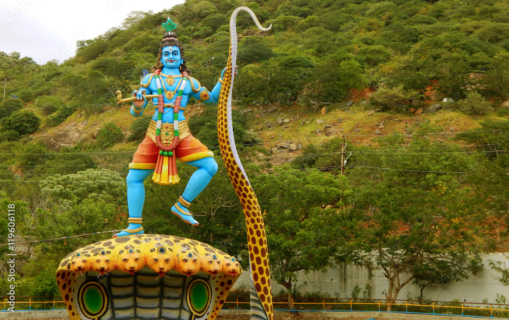:Statue of Lord krishna Hindu God playing with snake which came to kill ...