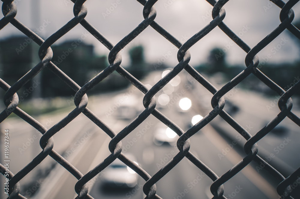 Image of chain link fence on bridge over pass. Chain fence on bridge ...