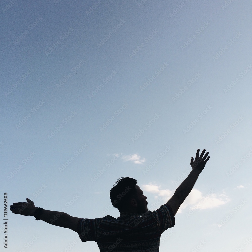 man raised his hands up. freedom concept Stock Photo | Adobe Stock
