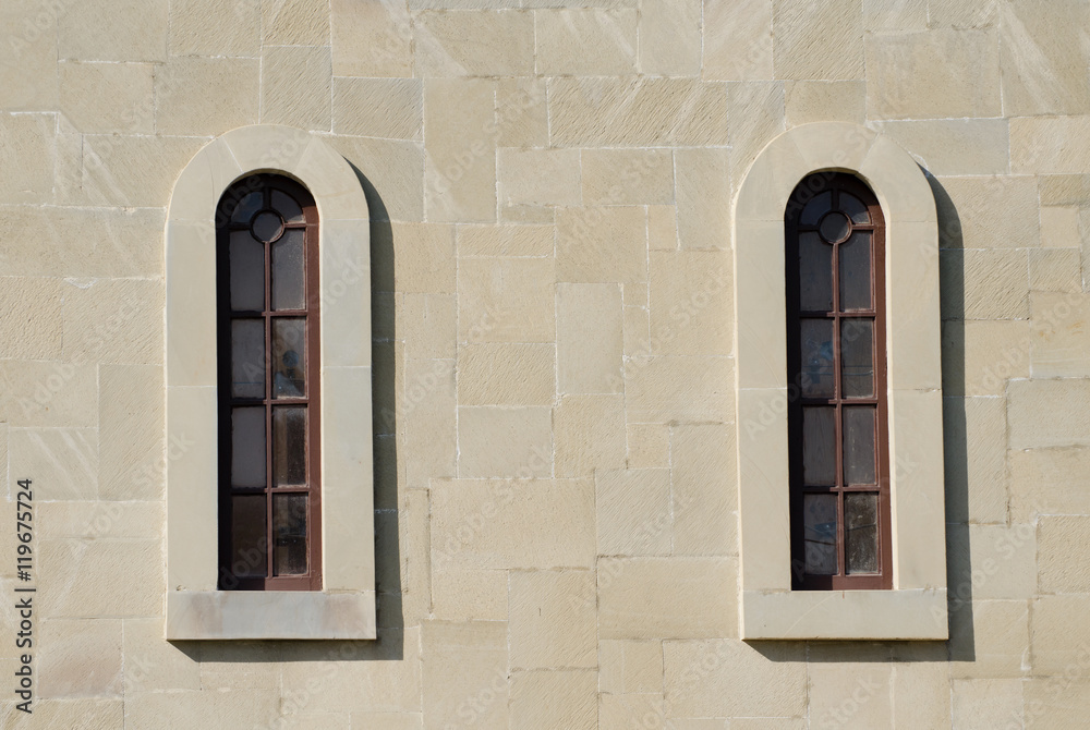 Two narrow arched windows in the old style Stock Photo | Adobe Stock