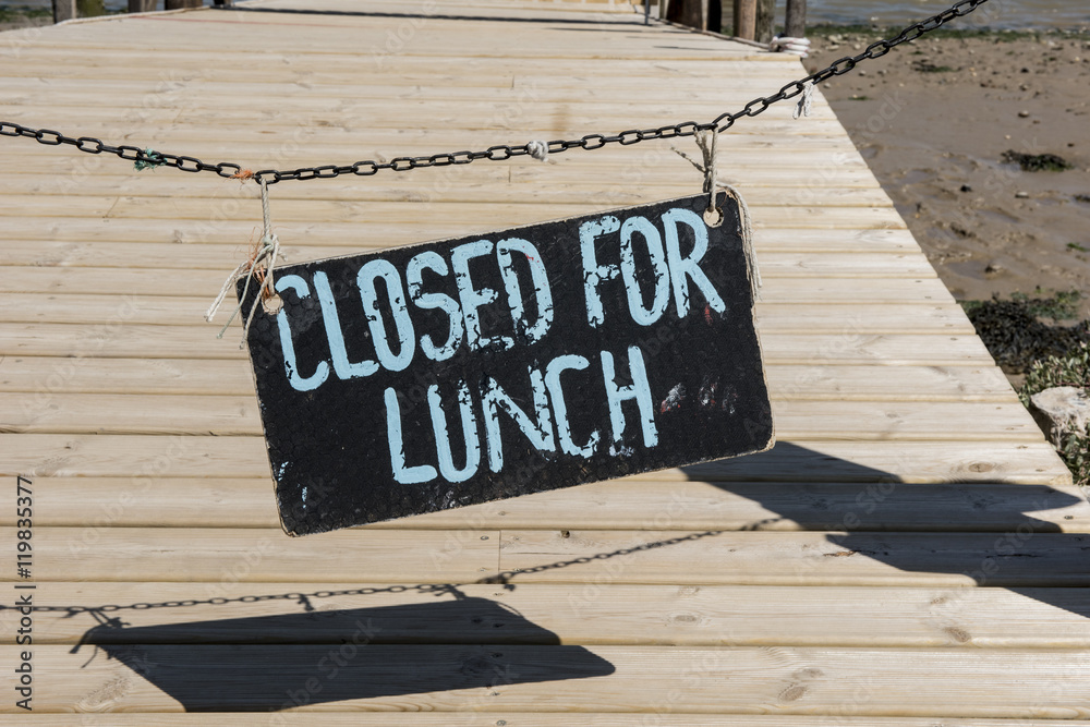 "Closed for Lunch" Sign Photos | Adobe Stock