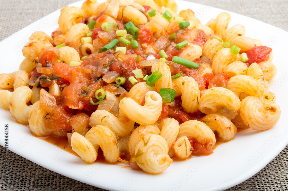 Cavatappi pasta with a sauce of stewed vegetables Stock Photo | Adobe Stock