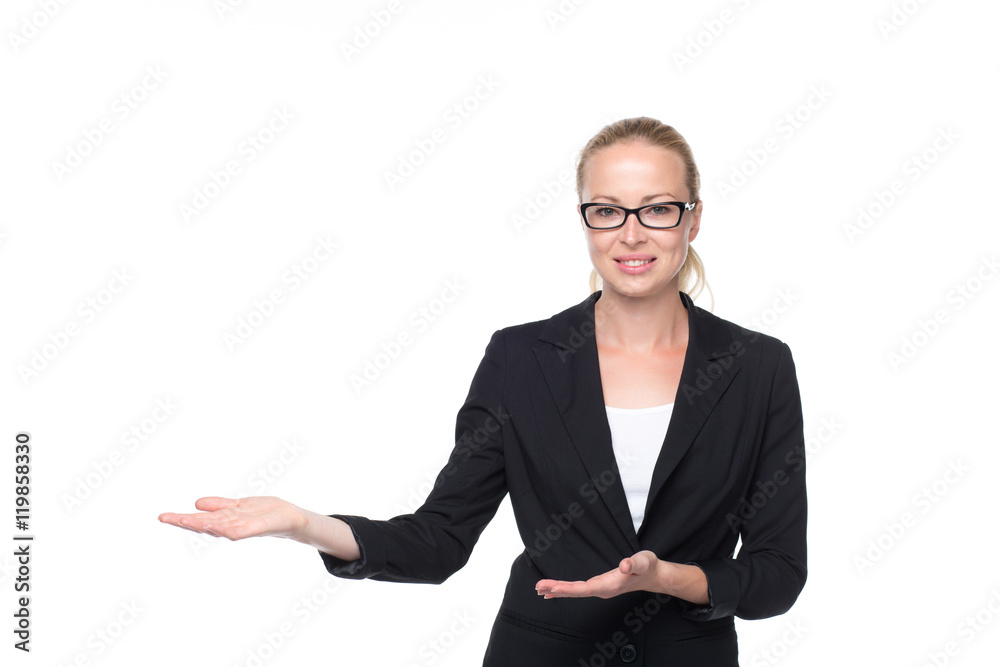 Beautiful young businesswoman smiling, holding open palm with empty ...