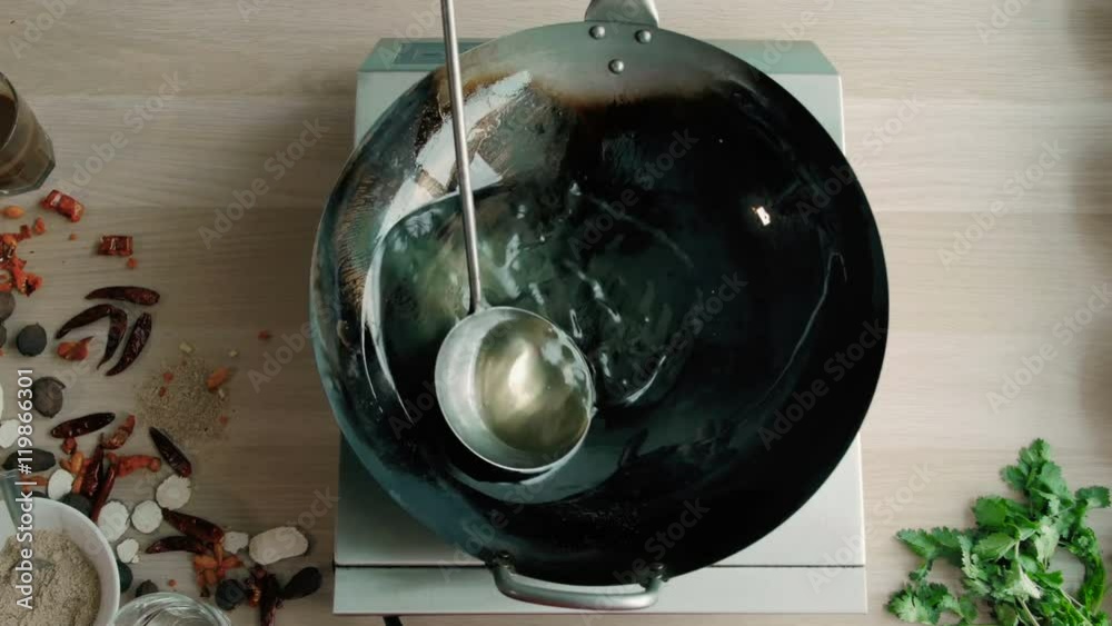 Chef Stirs Cooking Oil In Wok An Commercial Kitchen Stock Video | Adobe ...