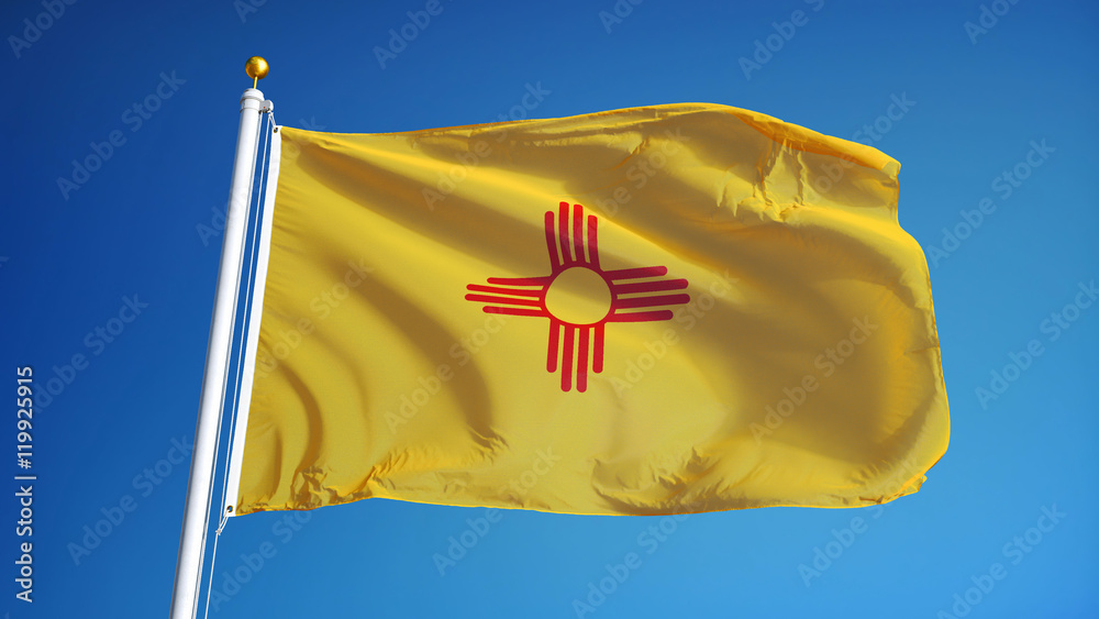 New Mexico flag waving against clean blue sky, close up, isolated with ...