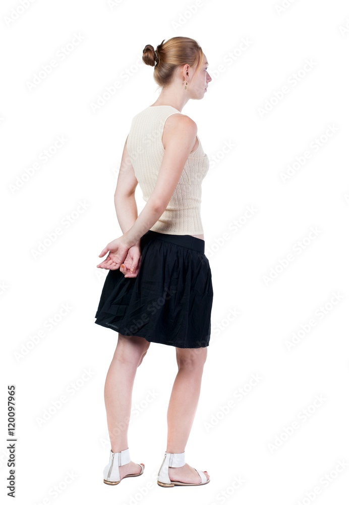 back view of standing young blonde woman. Rear view people collection ...