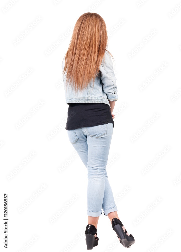 back view of standing beautiful red head woman. Young redhead girl in ...