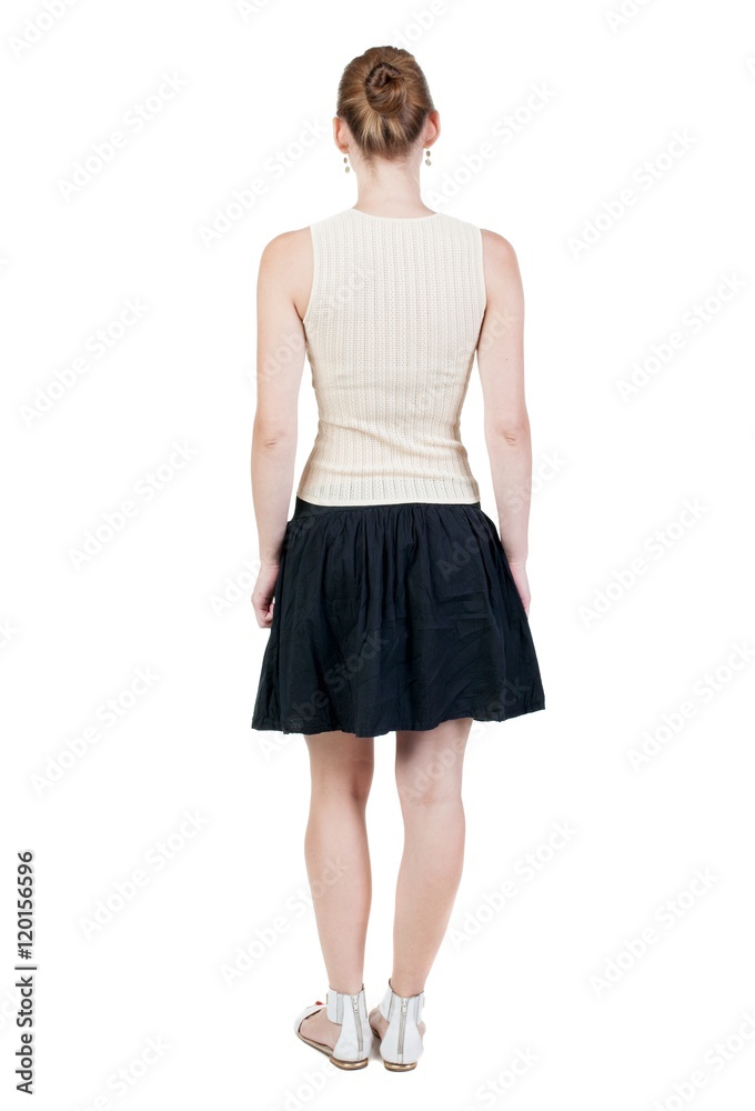 back view of standing young blonde woman. Rear view people collection ...