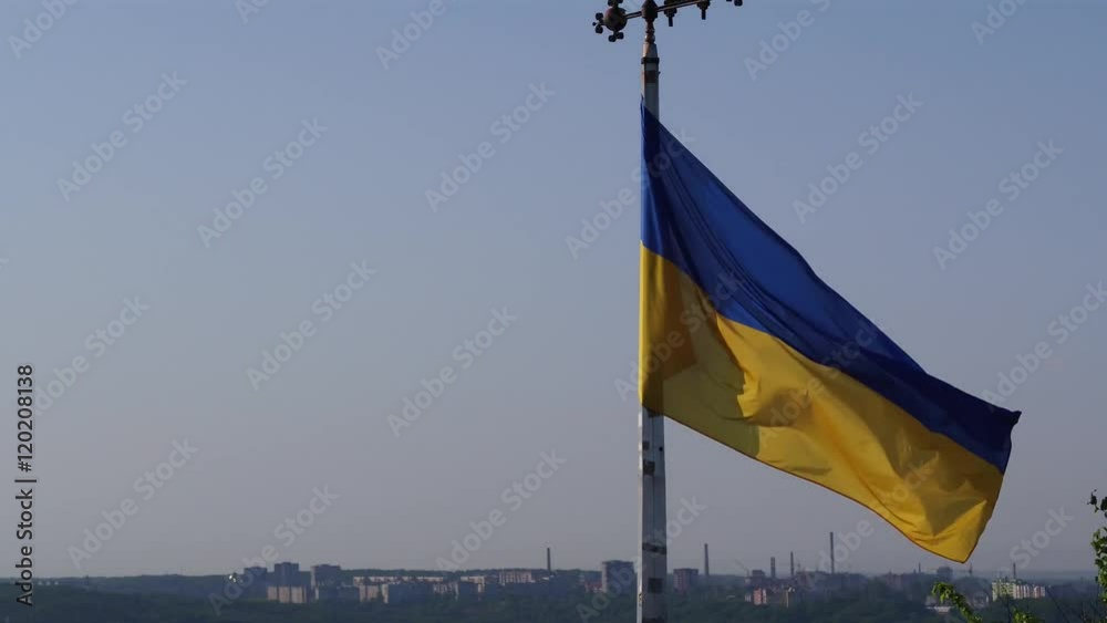 Ukrainian Flag Flying On Top Of The Beautiful Panorama Of The City Lviv