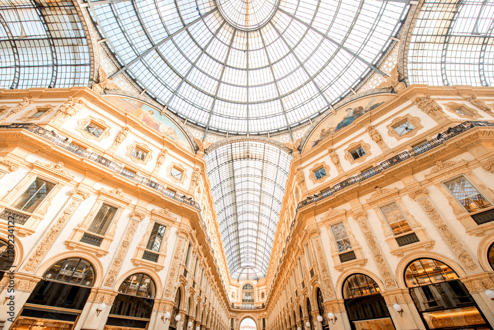 Interior with beautiful glass vaults in the famous Vittorio Emanuele ...