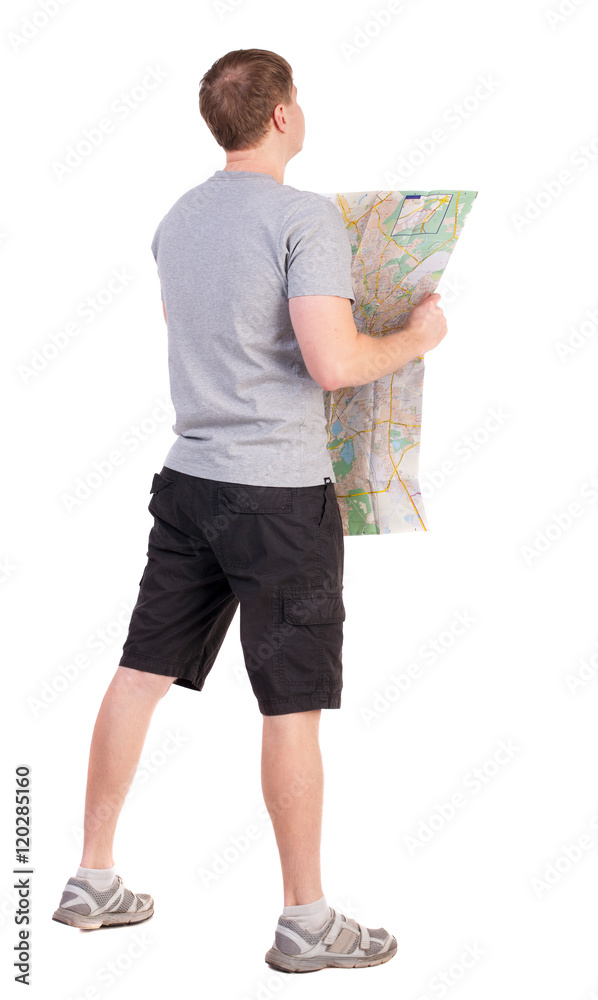 Back view of journey young man looking at the map. Rear view people ...