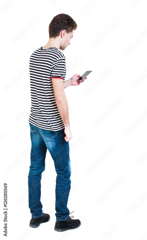 back view of man in suit talking on mobile phone. rear view people ...