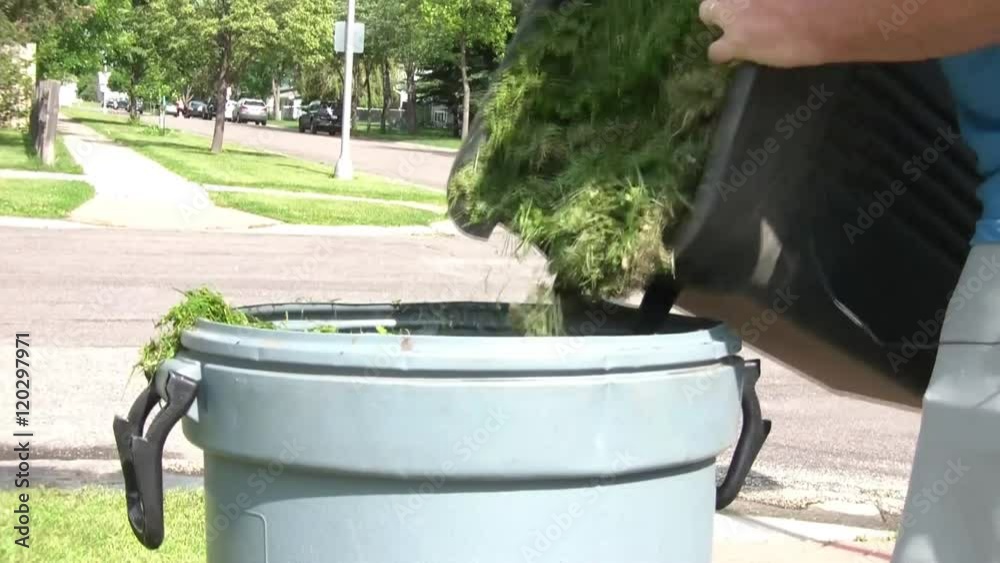 Man Dumping Cut Grass Stock Video | Adobe Stock