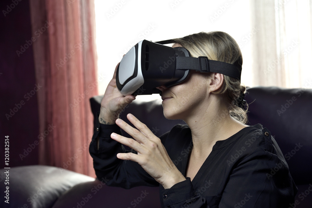 Woman in virtual reality Stock Photo | Adobe Stock