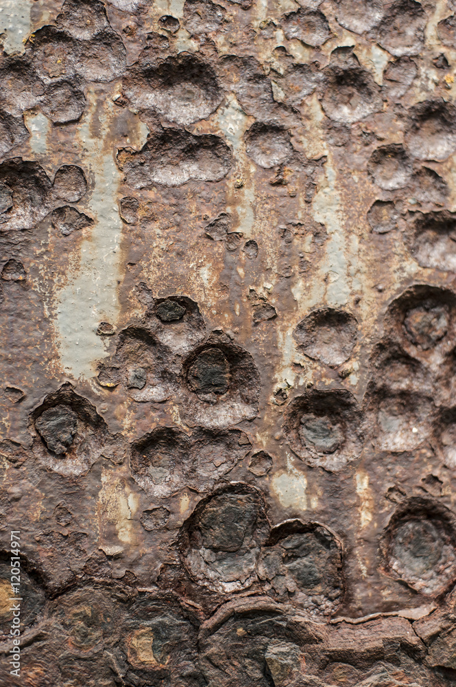 Pitted rusty bullet hole surfrace Stock Photo | Adobe Stock