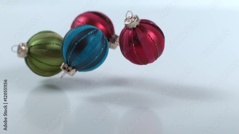 Christmas ornaments falling and bouncing in slow motion Stock Video ...