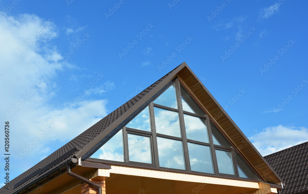 Modern house with metal roofing, panoramic window, skylight, roof ...