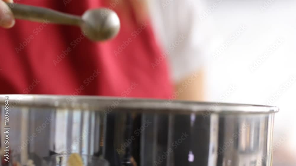 Measuring vanilla extract into mixing bowl Stock Video | Adobe Stock