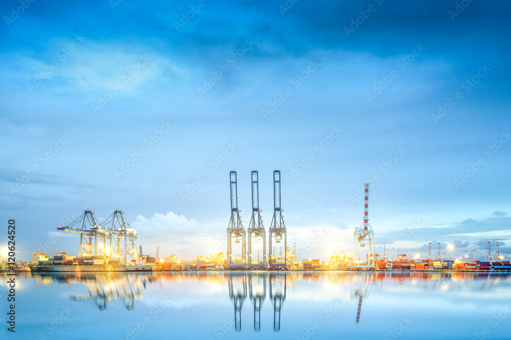 International Container Cargo ship with working crane bridge in ...