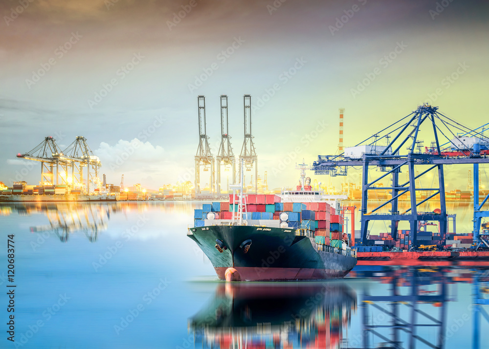 International Container Cargo ship with working crane bridge in ...