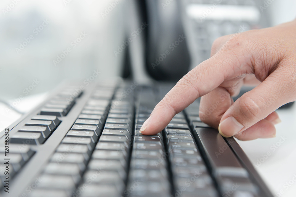 Human hand is typing to the computer keyboard Stock Photo | Adobe Stock