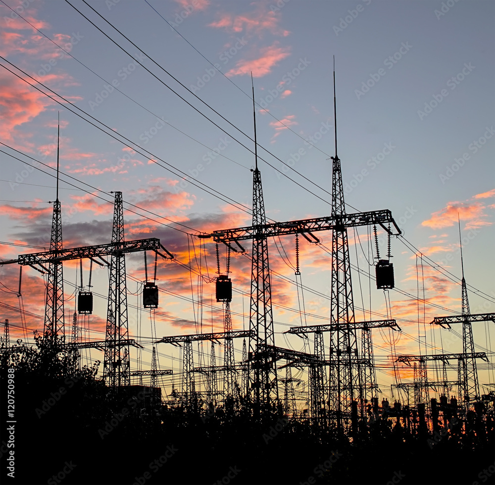 distribution electric substation pylon with lines, at sunset. Stock ...