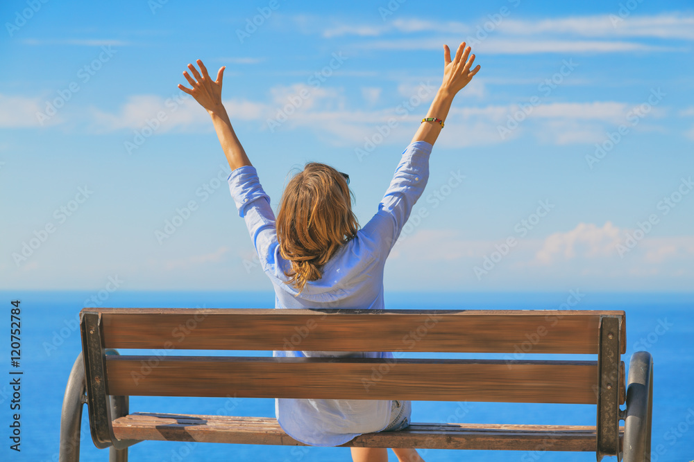 Girl enjoying the ocean / sea view. Stock-Foto | Adobe Stock