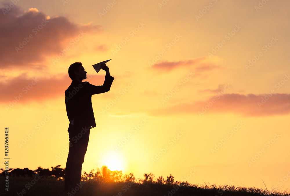 Taking flight. Man throwing paper airplane. Life goals and direction ...
