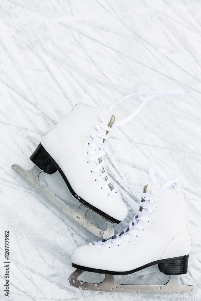 I love ice skating. Ice skates on rink background. Stock Photo | Adobe ...