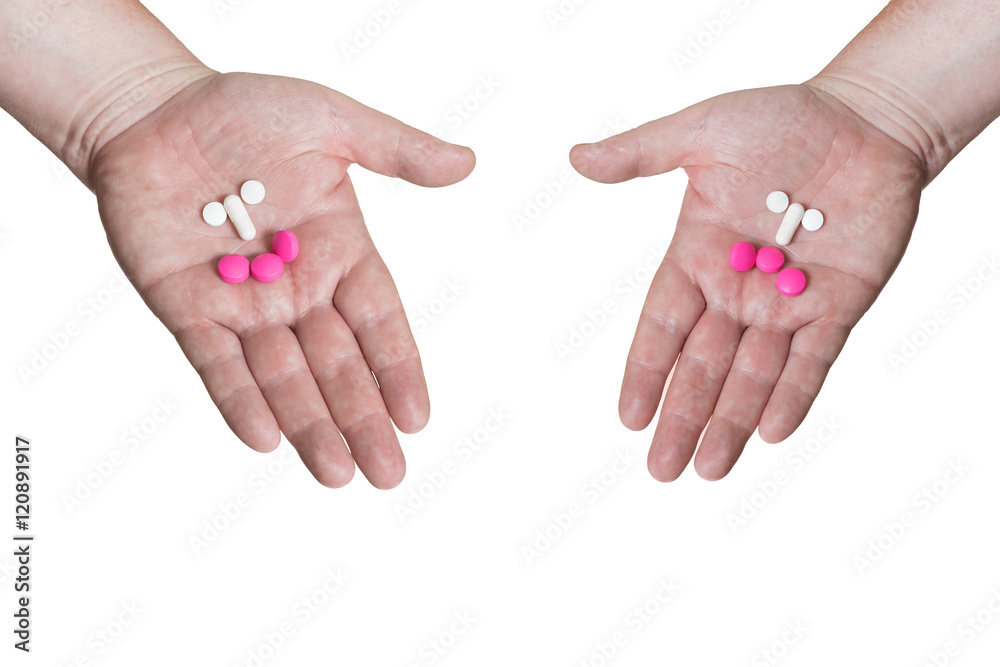 Good and bad drugs in open palms isolated on the white background. In ...