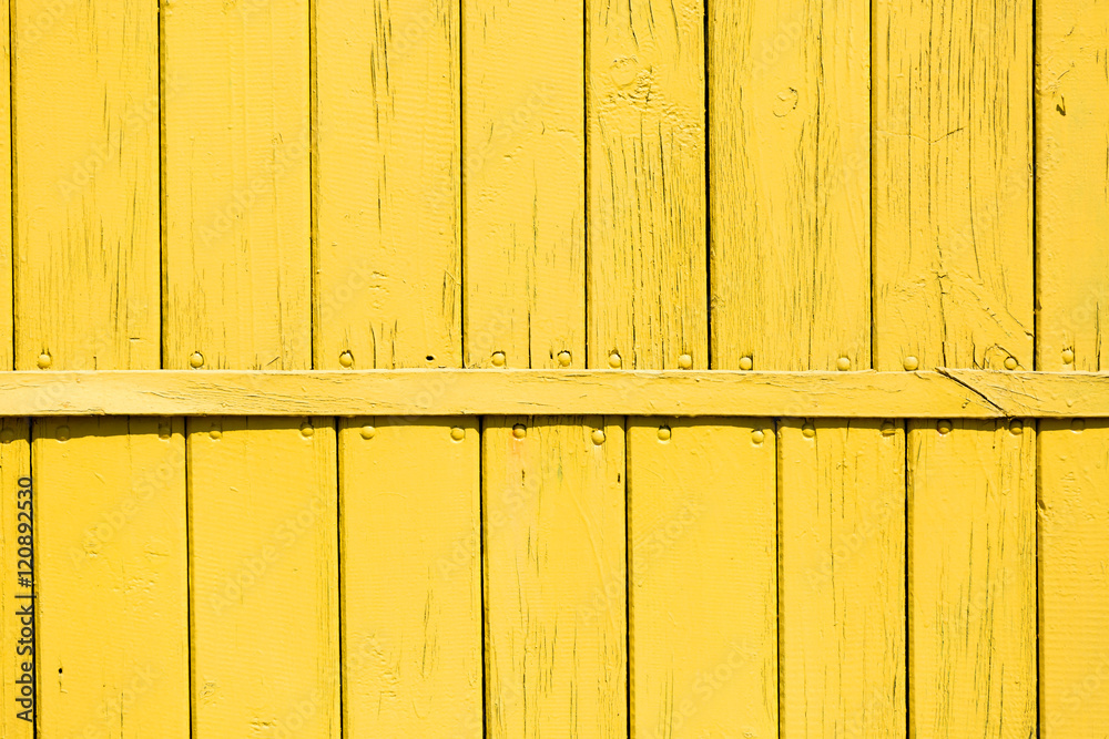wooden fence with yellow paint Stock Photo | Adobe Stock