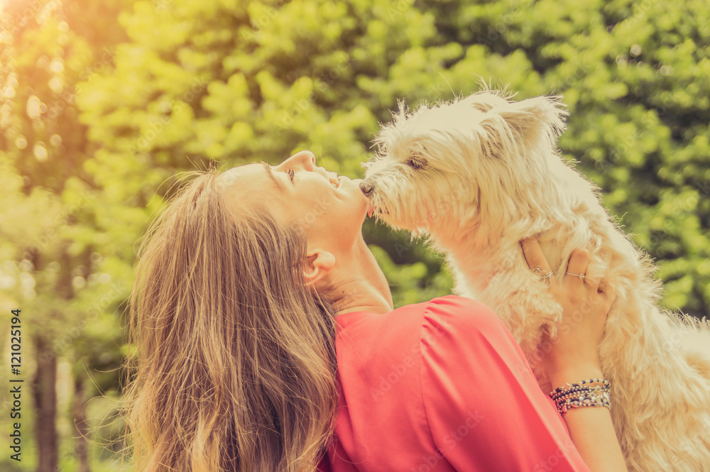 Dog kissing owner. Stock Photo | Adobe Stock