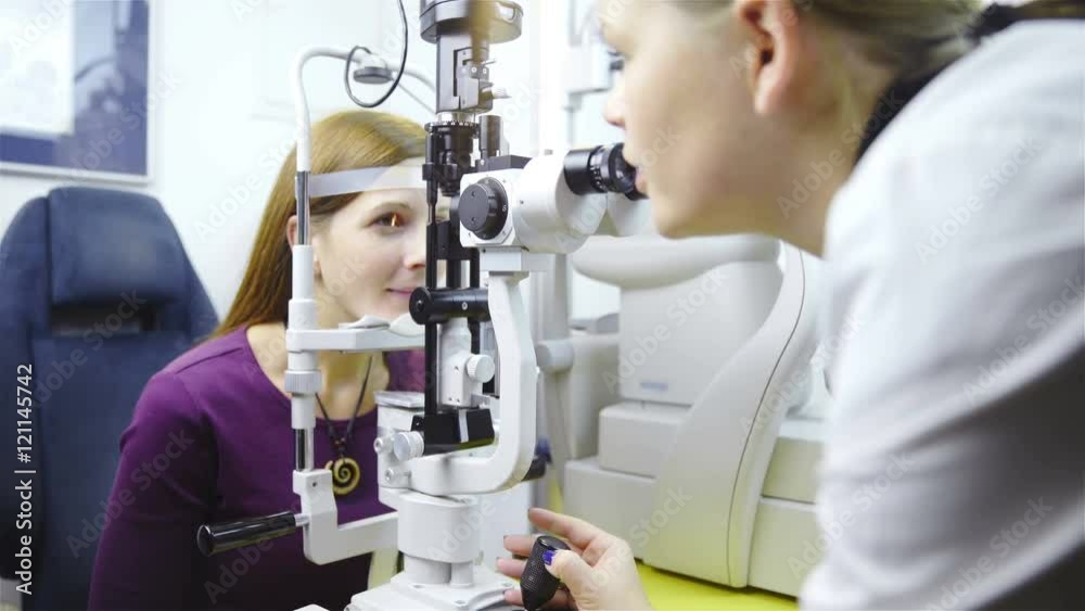 Doctor checking eyes with biomicroscope device 4K Stock Video | Adobe Stock