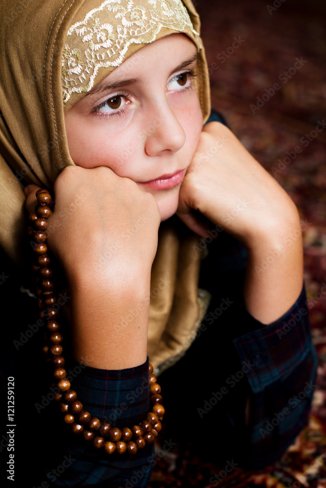 Little muslim girl Stock Photo | Adobe Stock