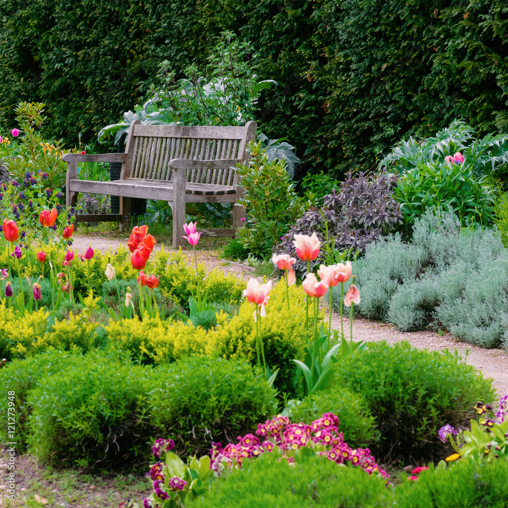 English Garden With A Walk Path Leading To Empty Bench Square 