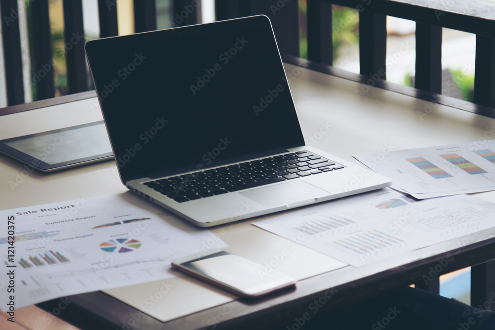 Business concept area work have laptop, chart and smart phone. The ...