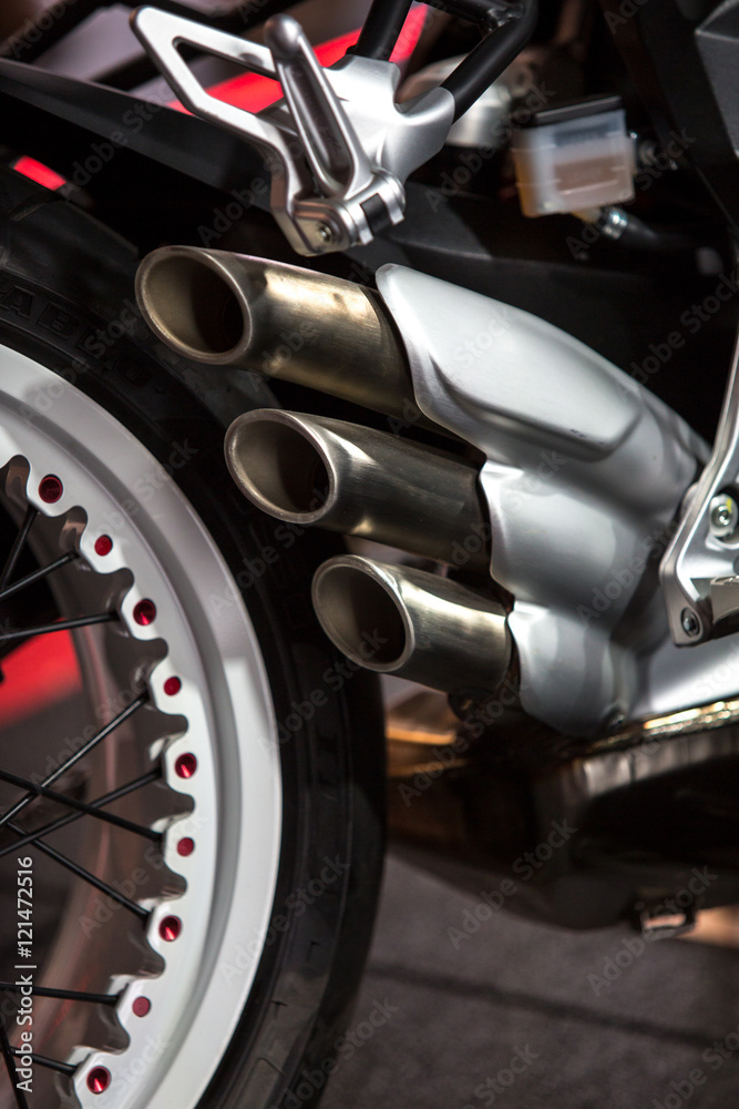 Sport modern Motorcycle tailpipe detail. Stock Photo | Adobe Stock