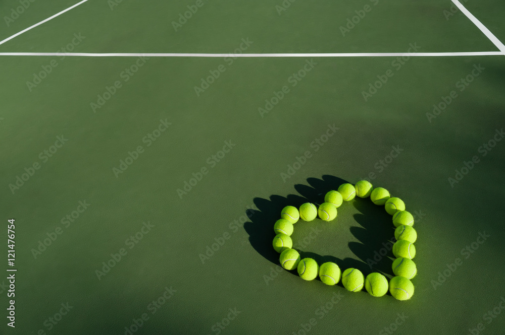 Tennis balls in shape of heart Stock Photo | Adobe Stock