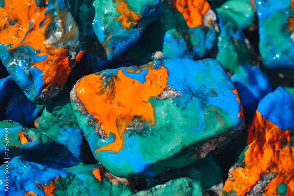 pebbles painted in different colors Stock Photo | Adobe Stock