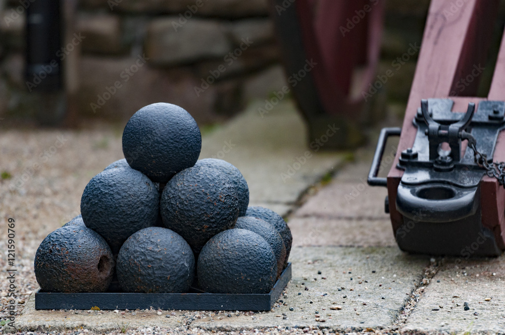 Iron Stacked Cannon Balls with Wooden Cannon Yolk Stock Photo | Adobe Stock