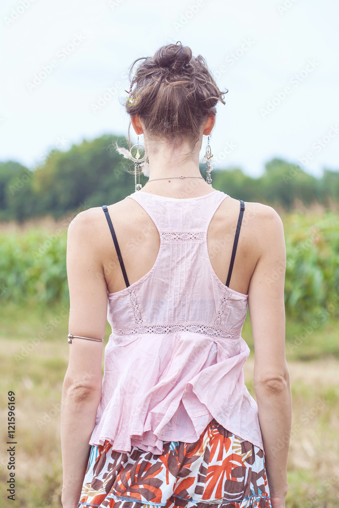 Girl standing in nature Stock Photo | Adobe Stock
