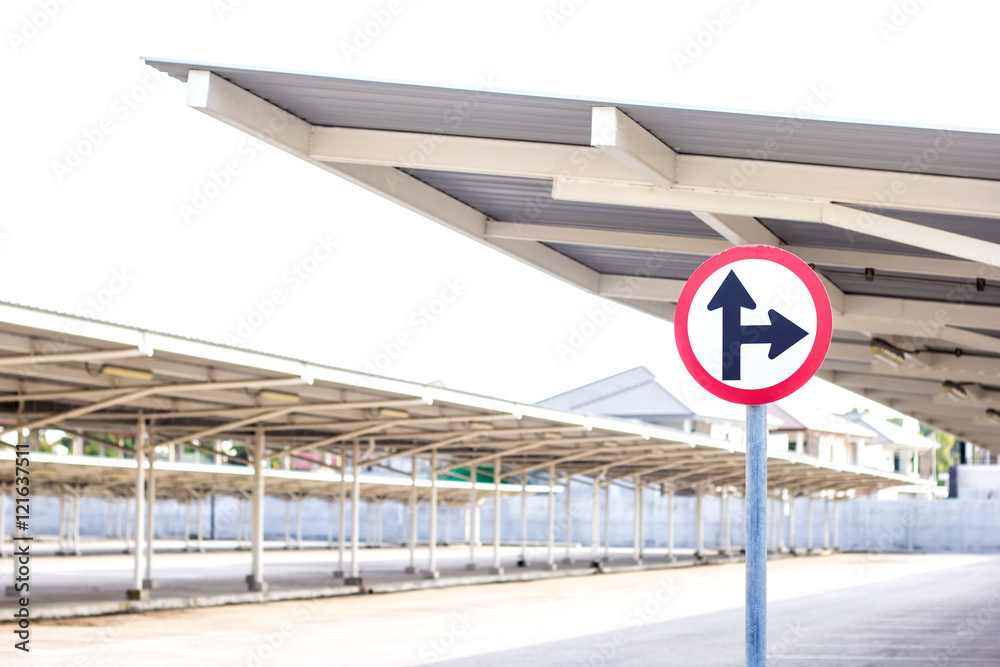 Traffic sign on empty car parking lot with roof background Stock Photo ...