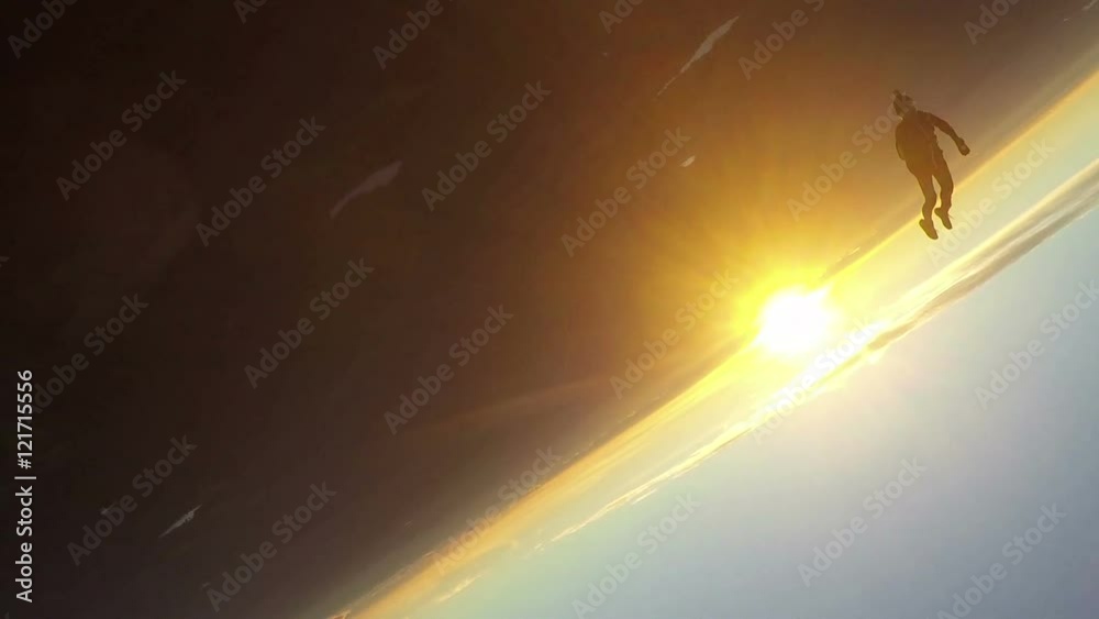 Skydiving in sunset Stock Video | Adobe Stock